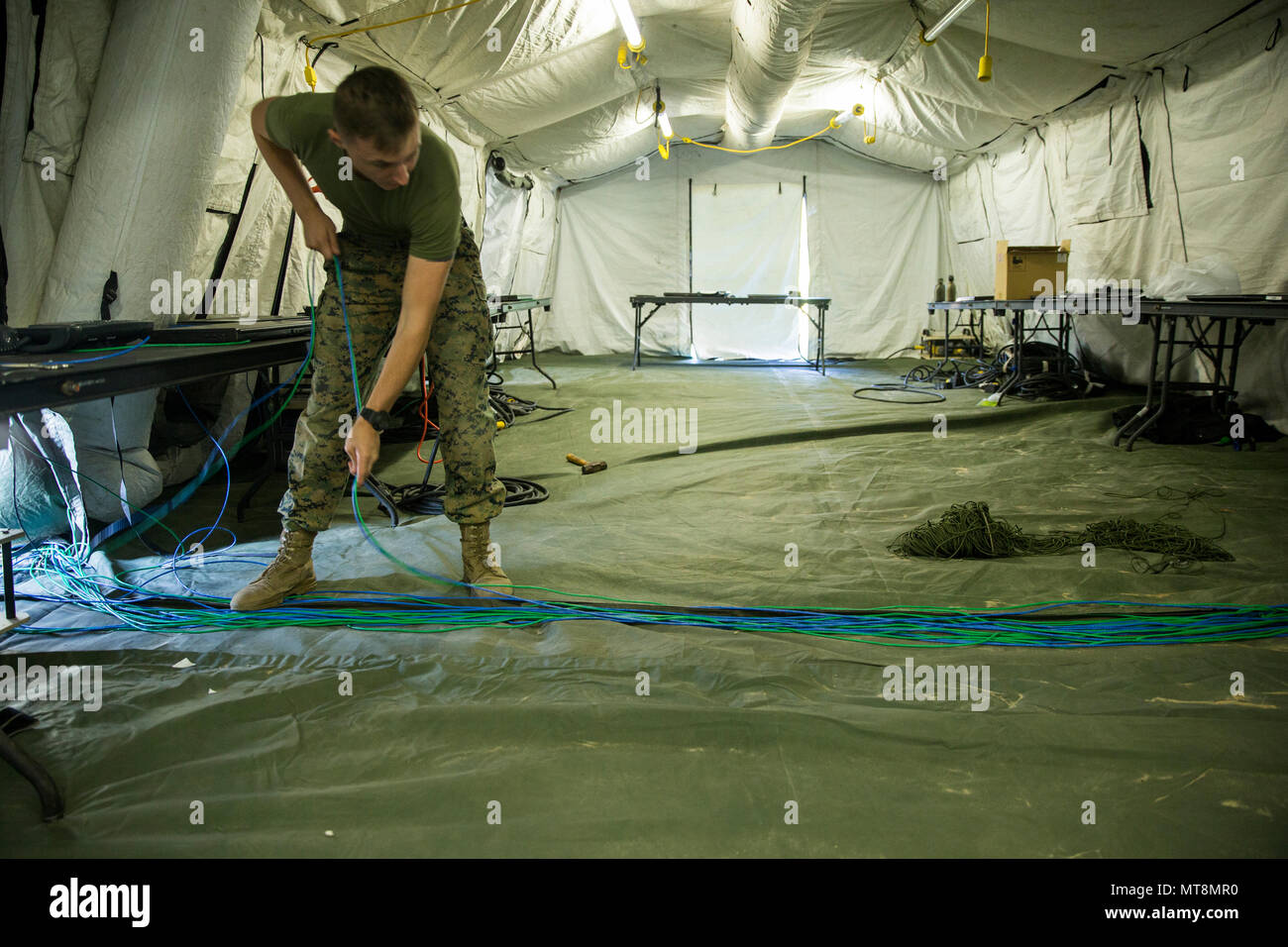 U.S. Marine Corps Lance Cpl. Ryan Wallin, with Communications Company ...