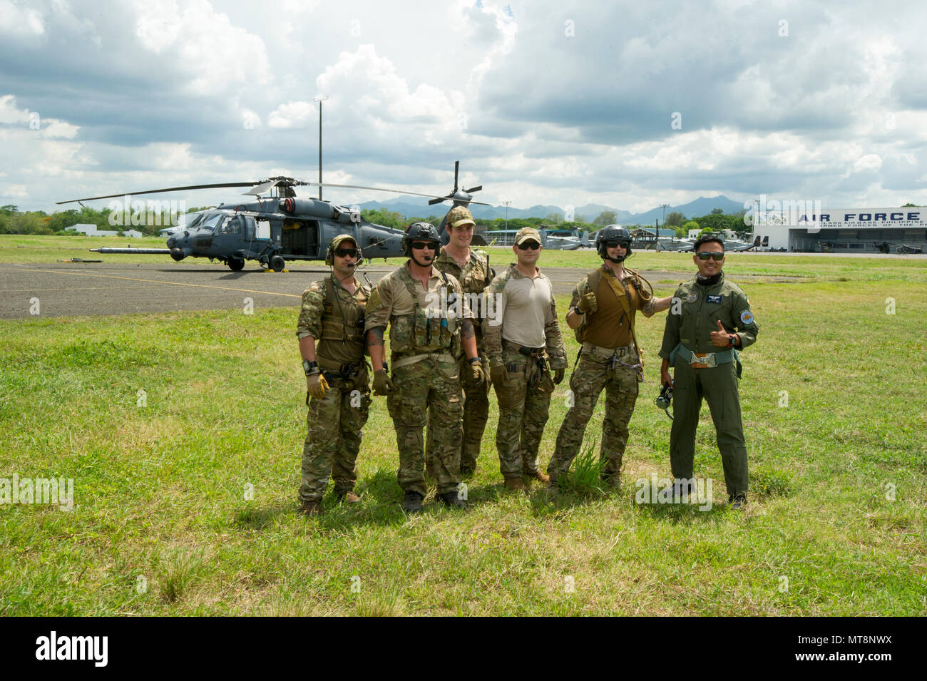 U.S. Air Force pararescuemen and flight surgeons from the 31st Rescue ...