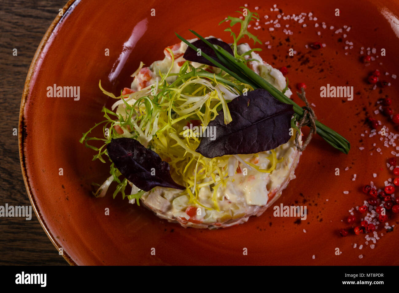 Traditional Russian salad with mayonaise Stock Photo - Alamy