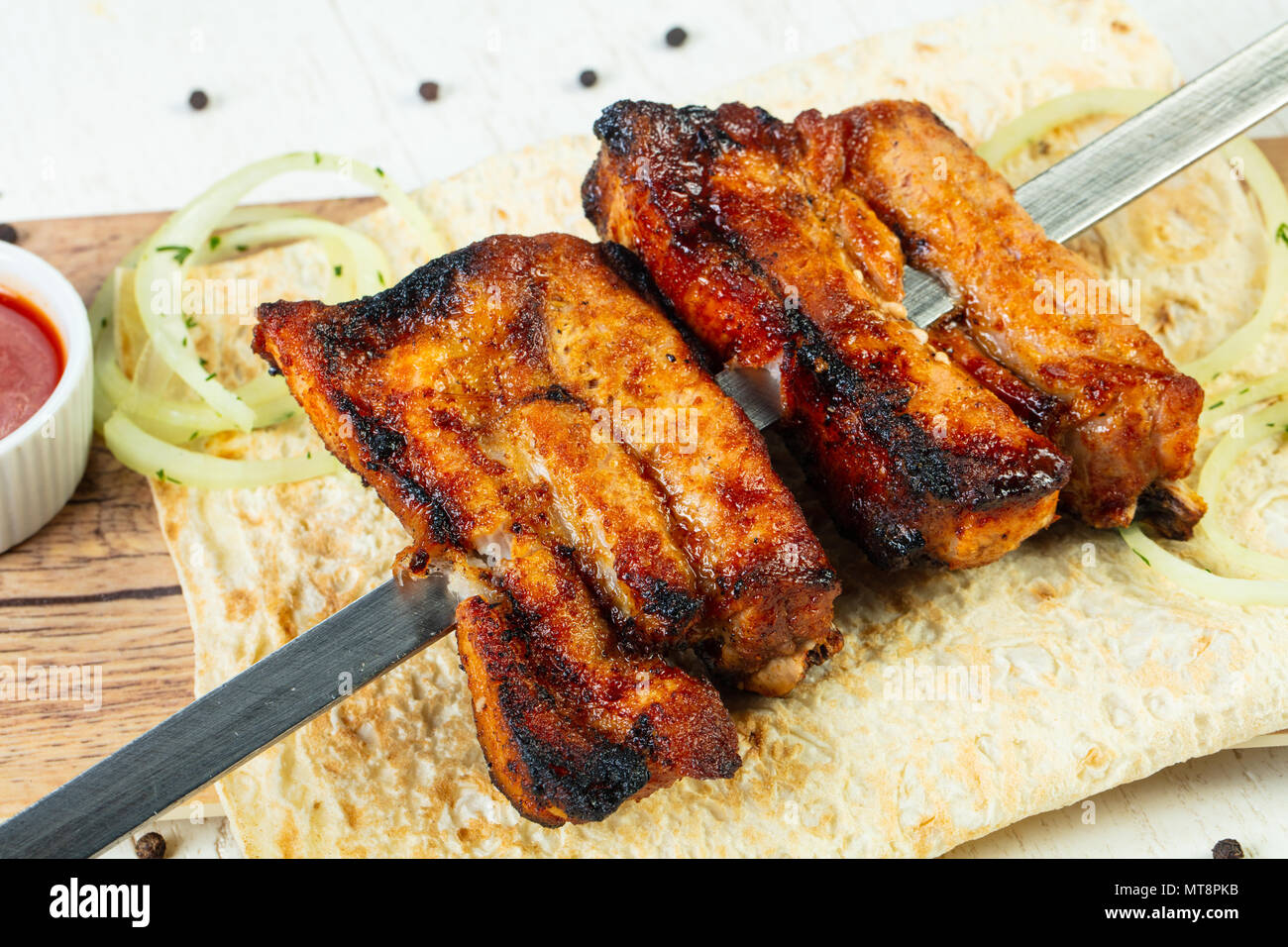 Grilled pork ribs skewer kebab Stock Photo - Alamy