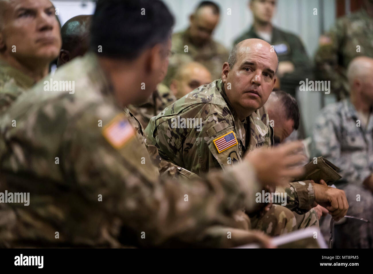 U.S. Army Lt. Col. Slade McPherson listens during a rehearsal of ...
