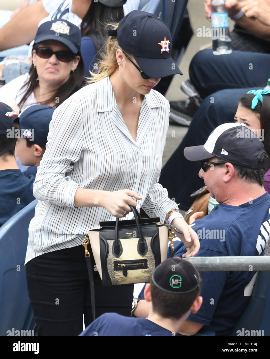 New York, NY, USA. 28th May, 2018. Kate Upton watches and cheers her ...