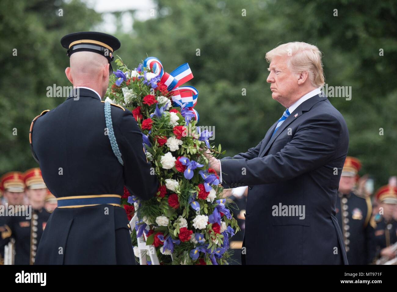 U.S President Donald Trump, right, places a wreath at the Tomb of the ...