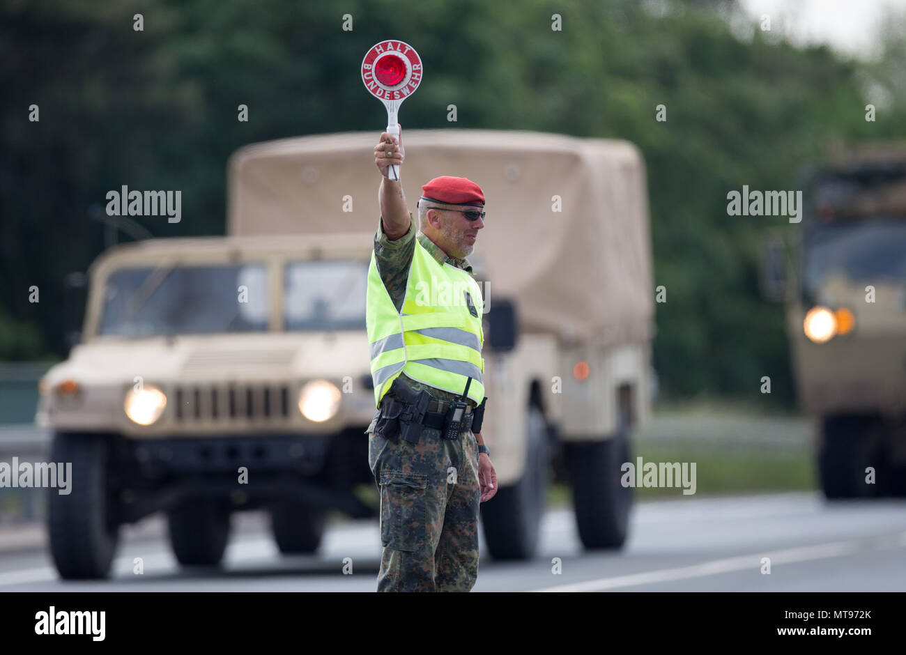 29 May 2018, Germany, Stukenbrock-Senne: A military police officer ...