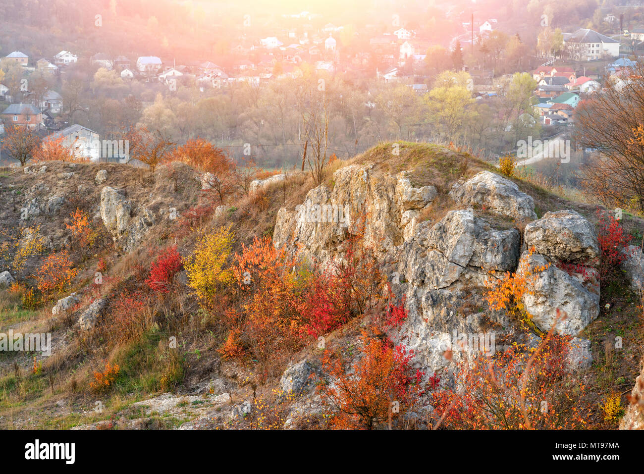 View on the beautiful colorful autumn landscape of the hills with trees ...