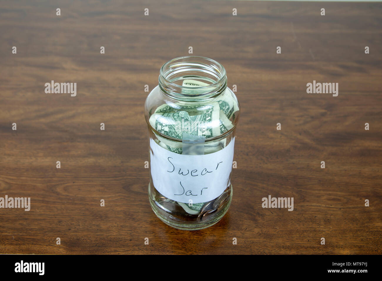 Swear jar office hi-res stock photography and images - Alamy