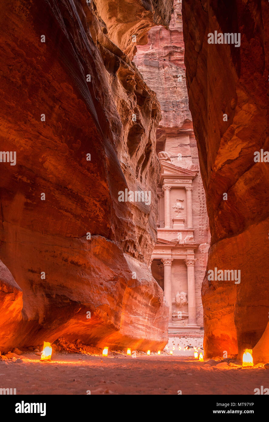 Petra by night, Jordan. The symbol of Petra, the Treasury and the Siq ...