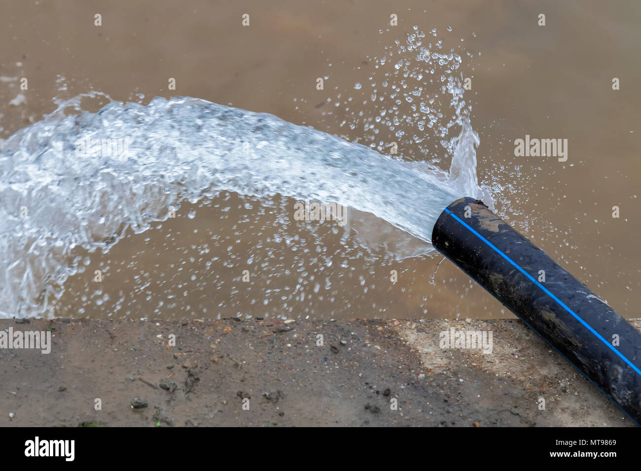 Pumping flood water into the river from a flooded area, flood control ...