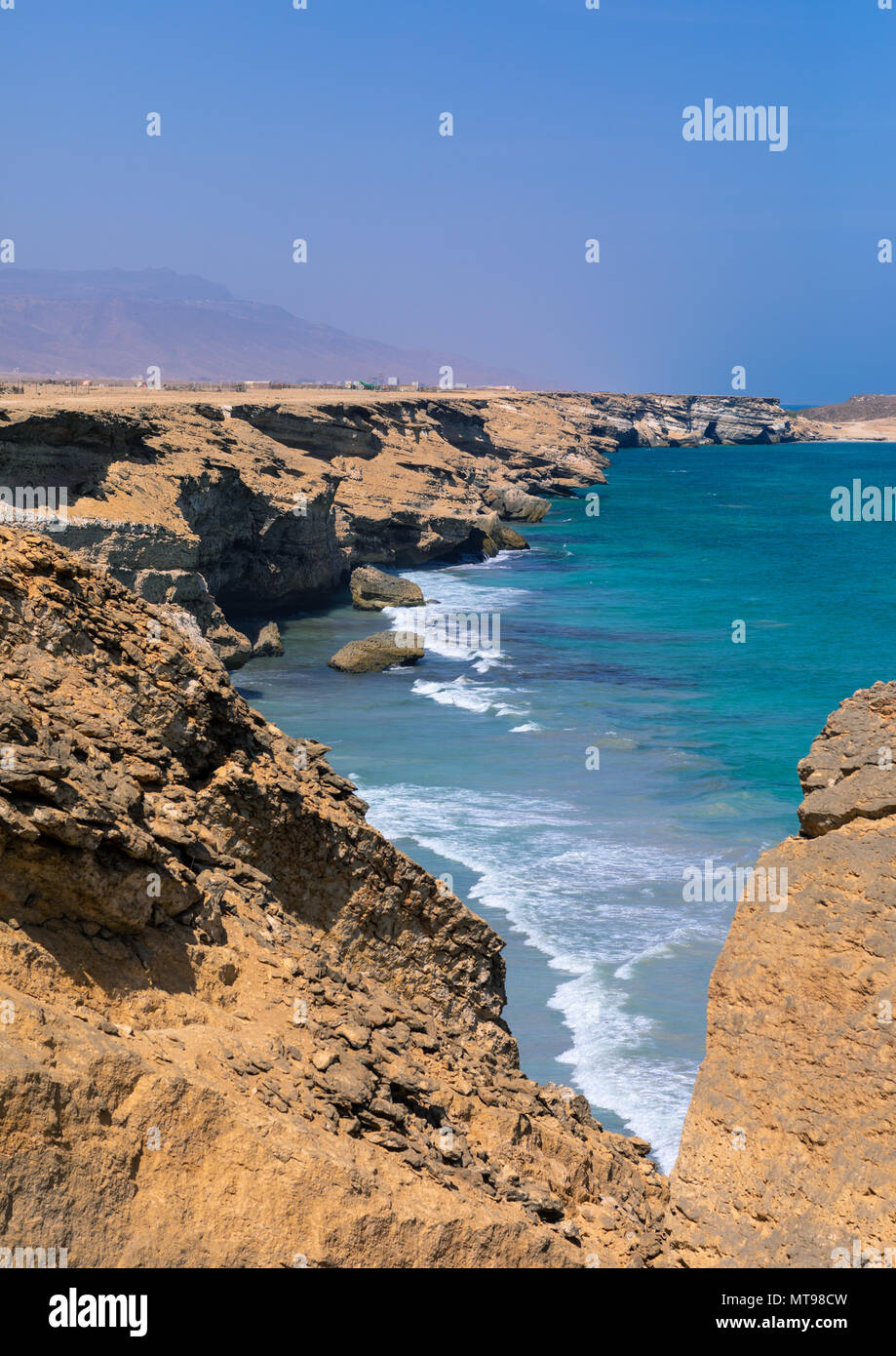 Seaside and cliffs, Dhofar Governorate, Taqah, Oman Stock Photo - Alamy