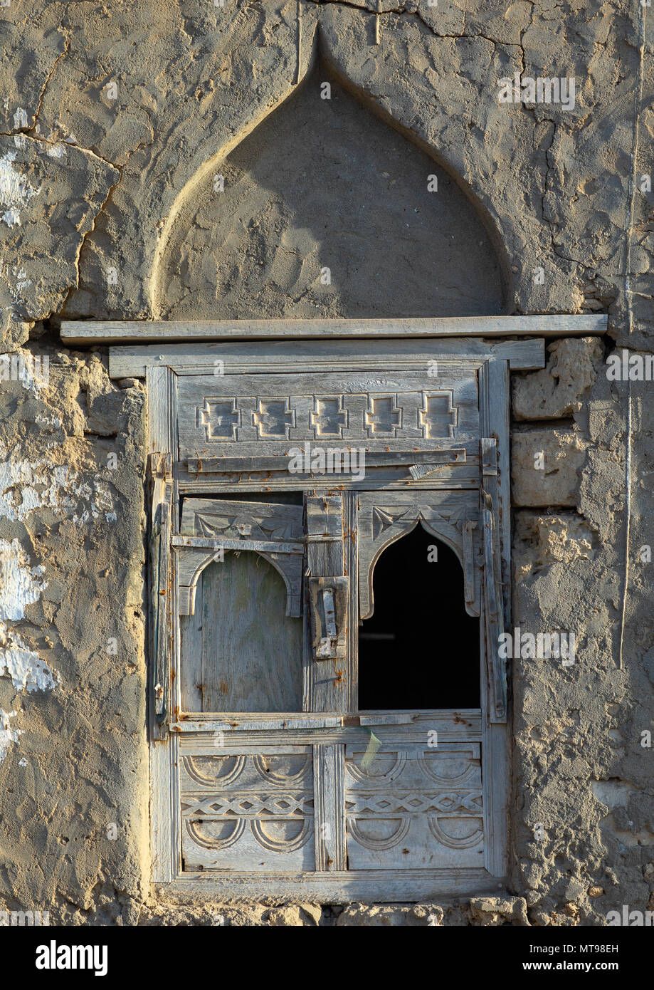 Wooden carved window of an abandoned house, Dhofar Governorate, Mirbat ...