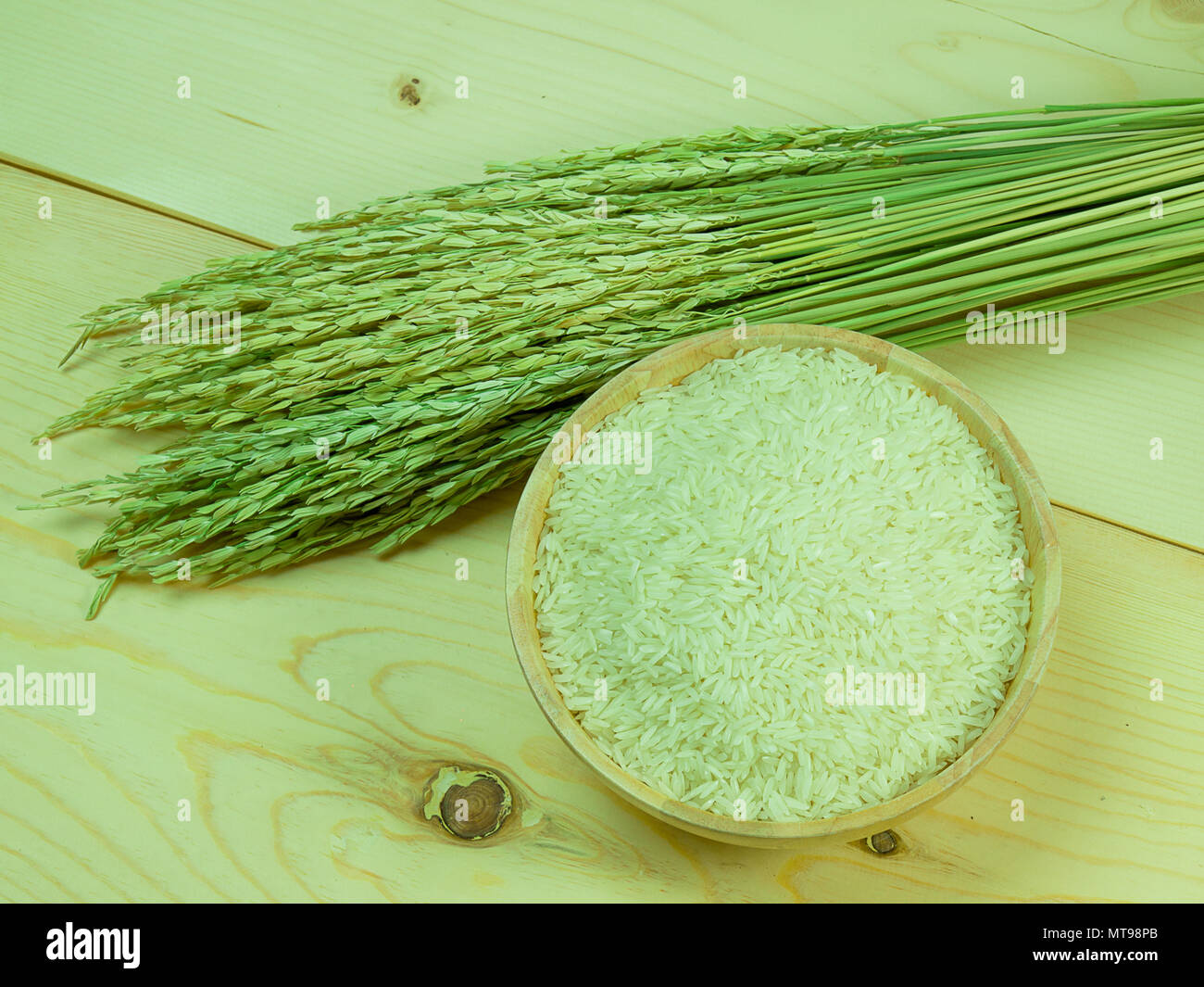 White rice plants and rice grains on wood Stock Photo - Alamy