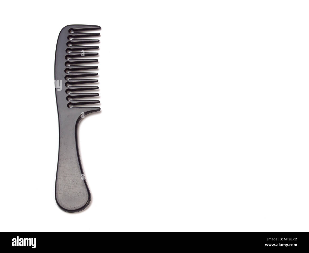Large black comb , On a white background Stock Photo - Alamy