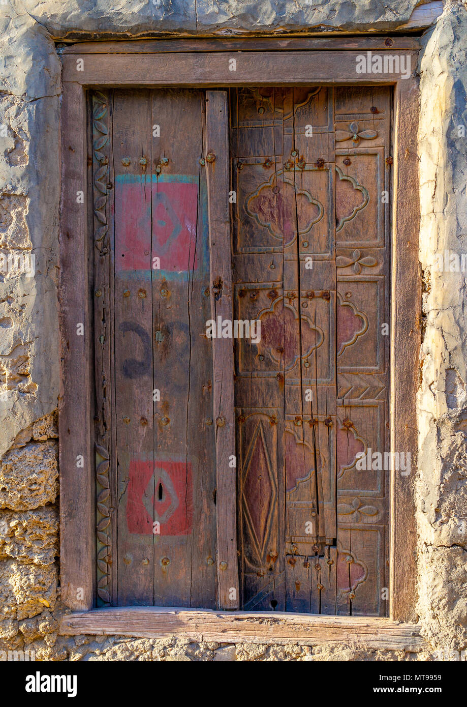 Omani wooden door, Dhofar Governorate, Mirbat, Oman Stock Photo - Alamy