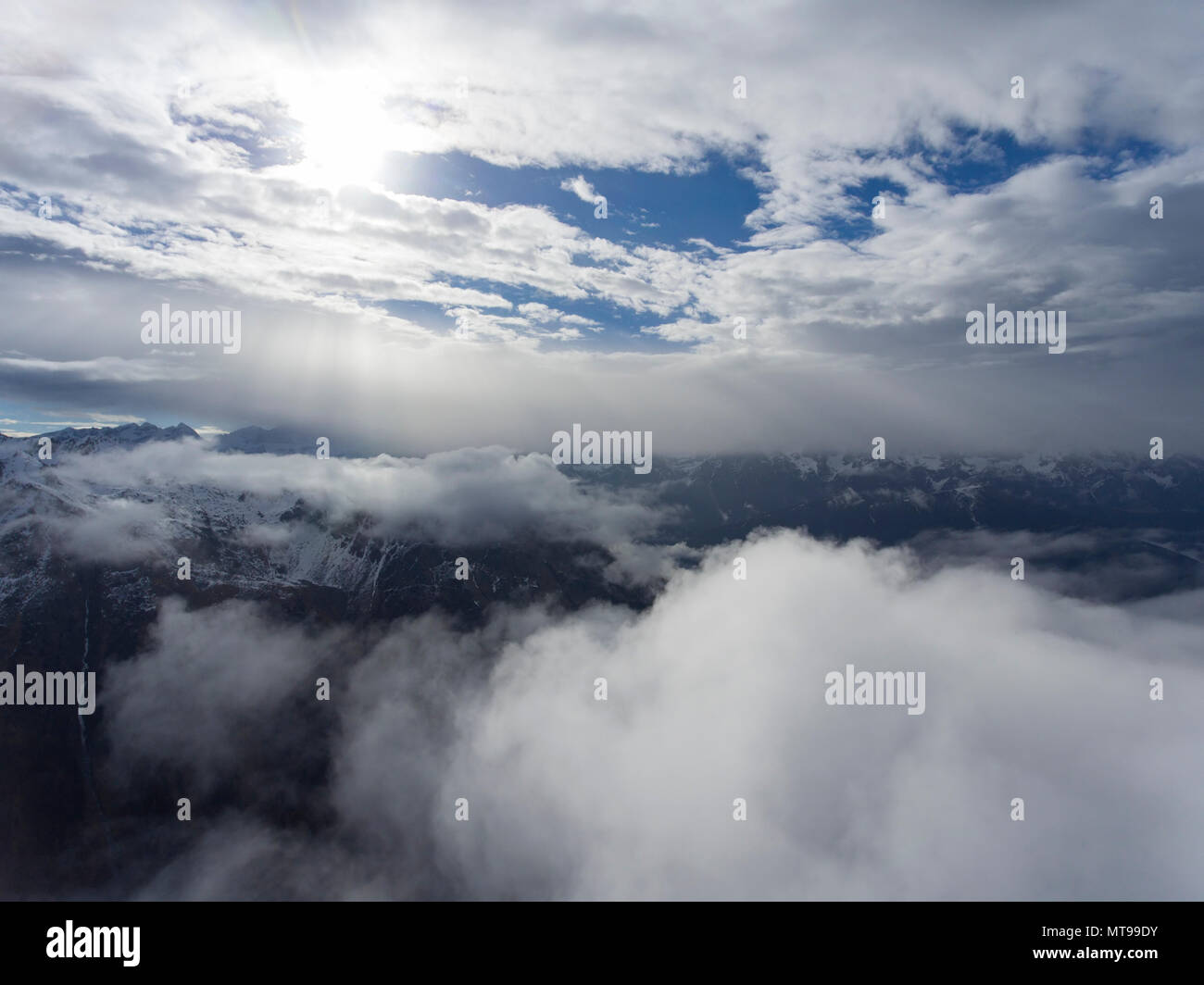 Aerial landscape with sun and mountains Stock Photo - Alamy