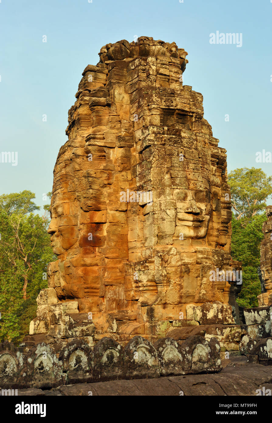 Giant stone faces at Bayon Temple in Cambodia Stock Photo - Alamy