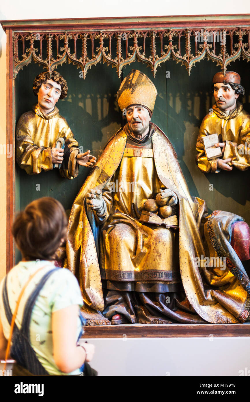 MUNICH, GERMANY - MAY 22, 2018: tourist views art in in Bavarian National Museum in Munich city ...