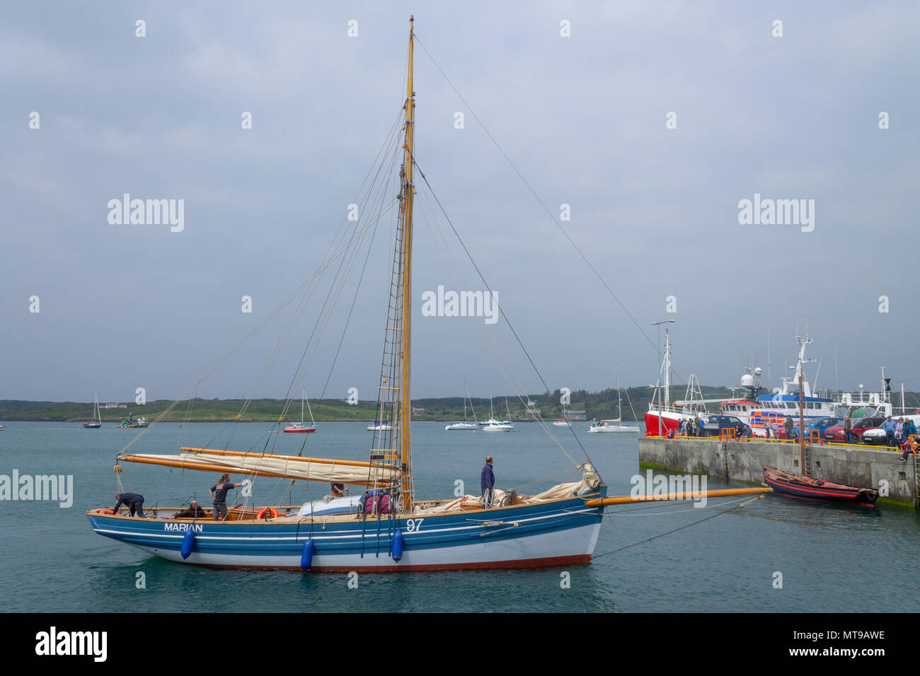 wooden ship marian coming alongside the quay at Baltimore, Ireland ...