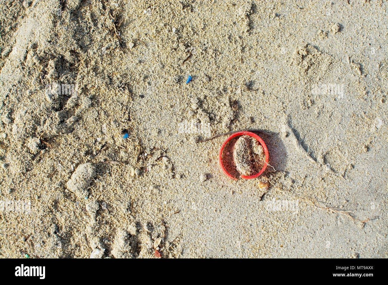 Plastic trash on sandy winter beach in Palma de Mallorca, Spain Stock ...