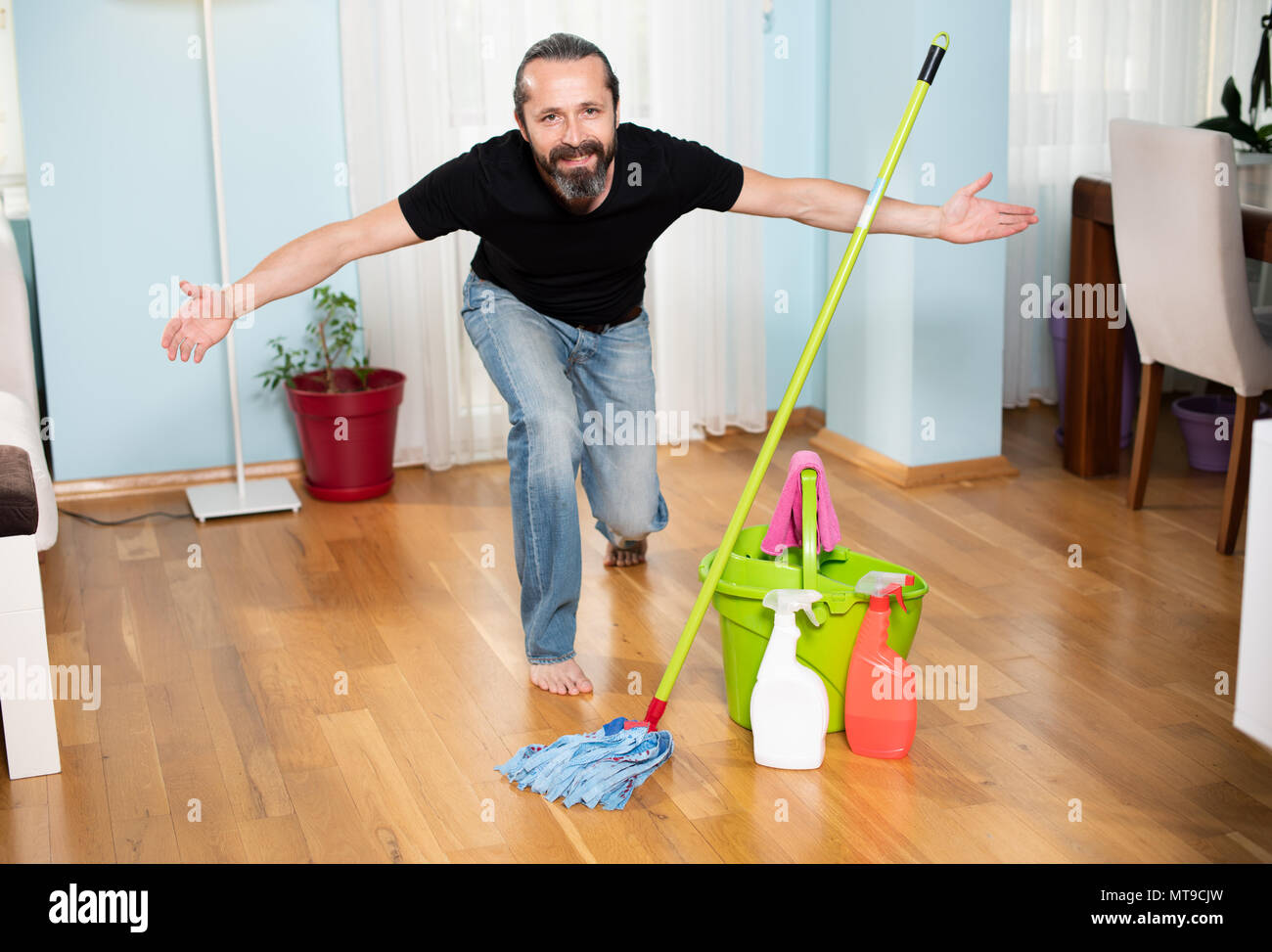 House cleaning, house cleaning man, house man sweeping and mopping ...