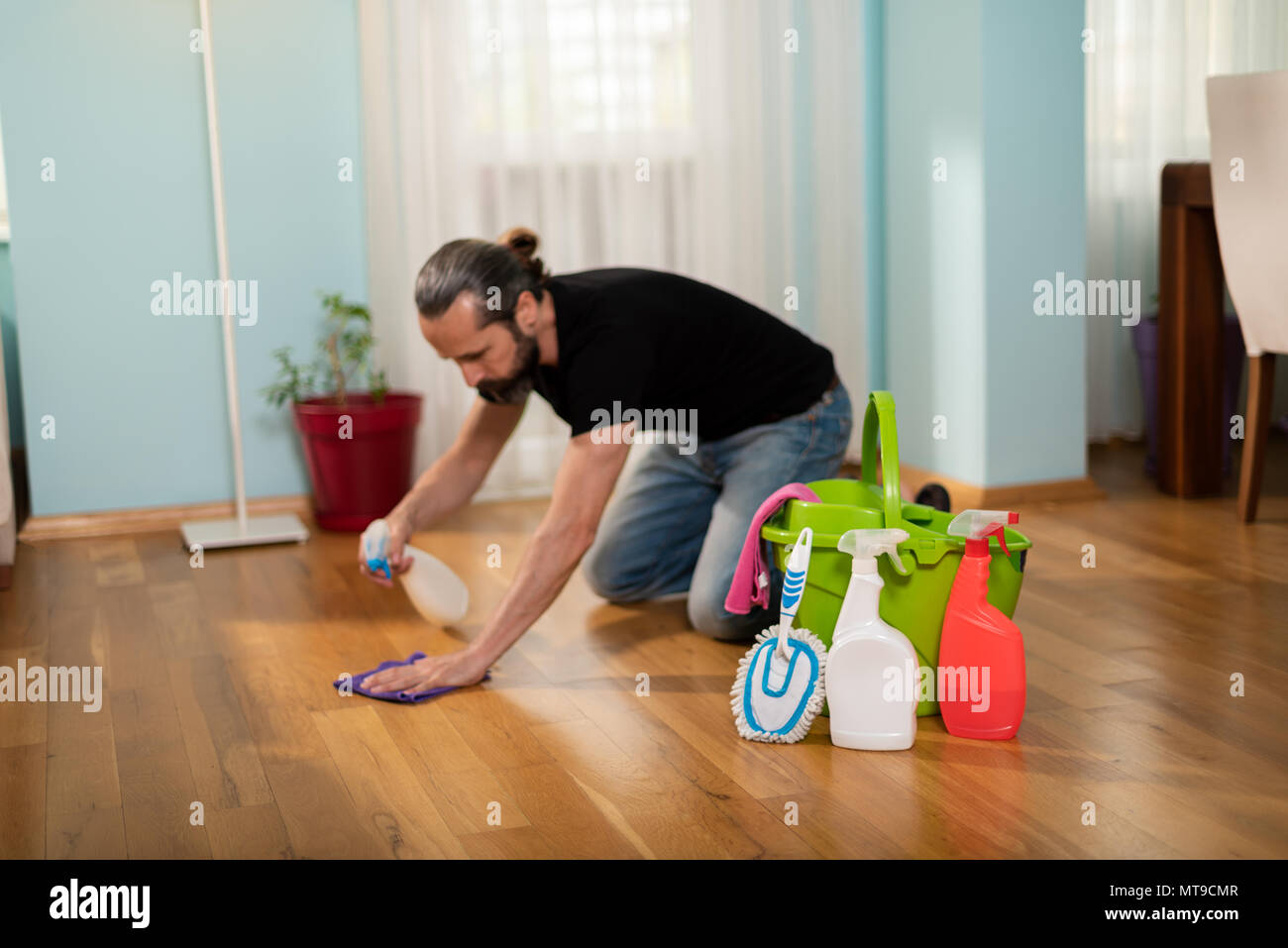 House cleaning, house cleaning man, house man sweeping and mopping ...