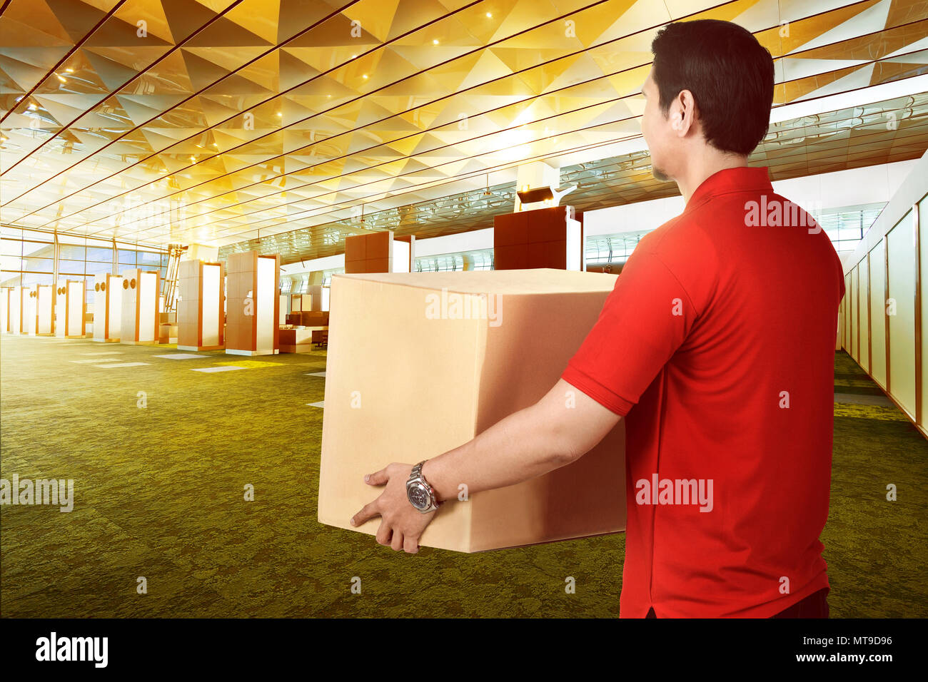 Professional asian male courier carrying parcel for delivered to people ...