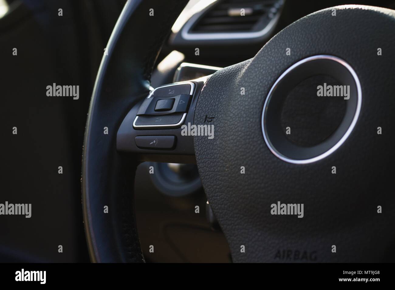 Steering wheel with remote radio controls in european car Stock Photo ...