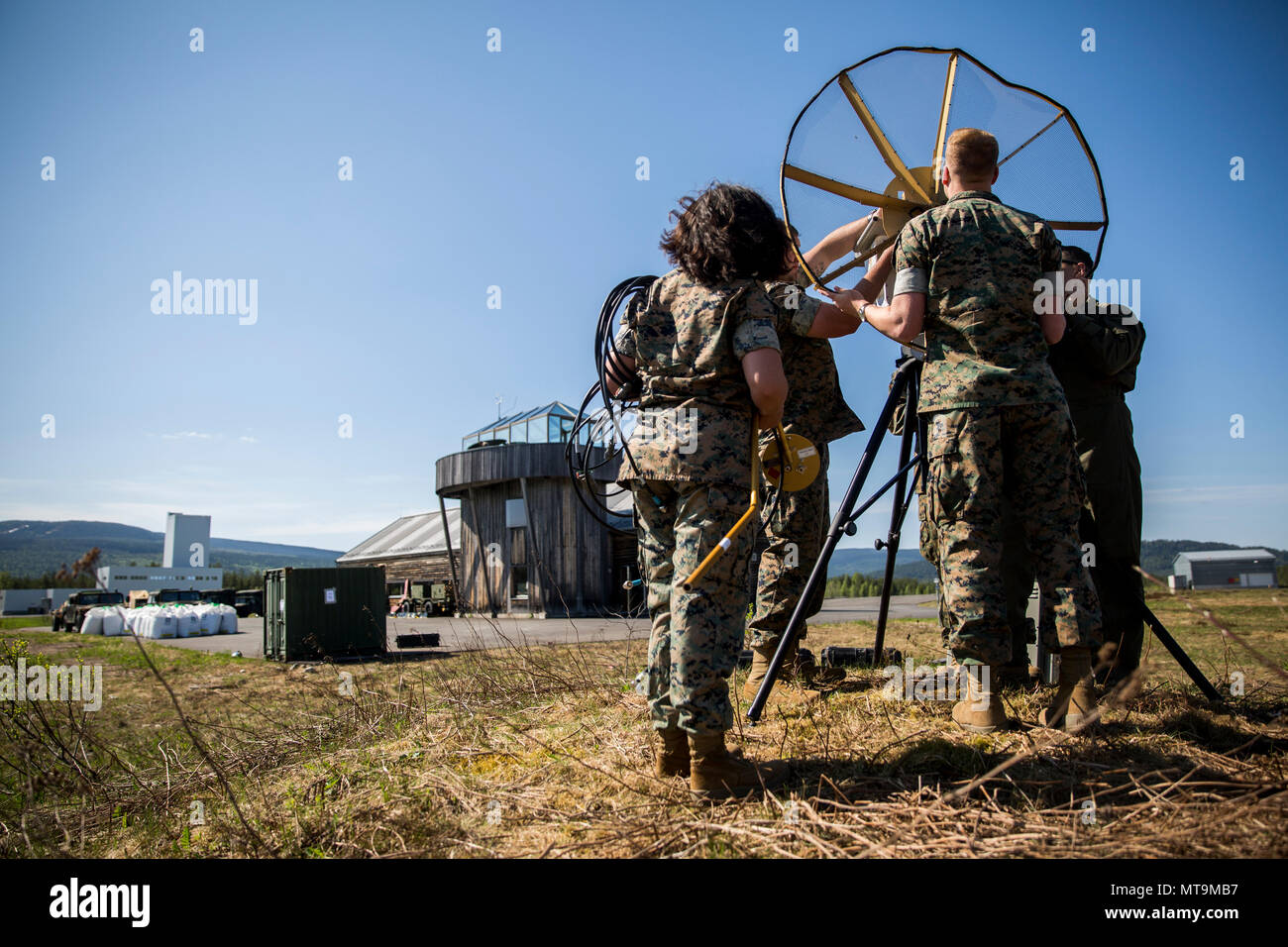 U.S. Marines with Marine Unmanned Aerial Vehicle Squadron 2 set up a ...