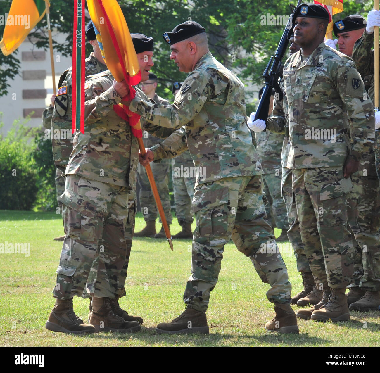 Command Sgt. Maj. Alberto Delgado, outgoing command sergeant major of the 21st Theater ...