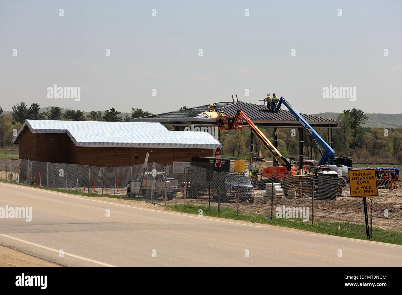 Workers with Catamount Constructors, Inc. of Lakewood, Colo., continue construction of the Fort ...