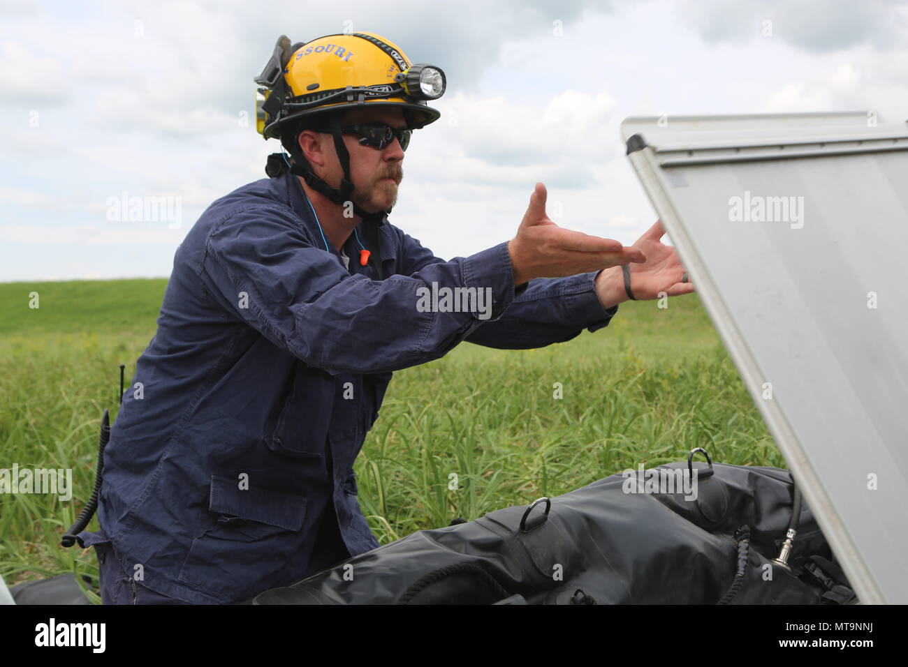 A squad leader of Missouri Boone County Task Force 1 swift water rescue ...
