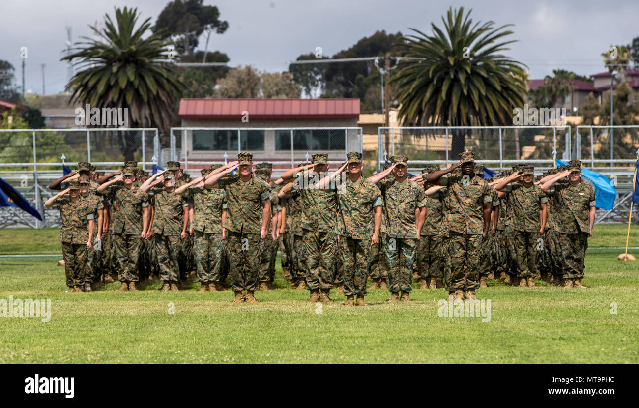Marines from across the I Marine Expeditionary Force salute during the ...