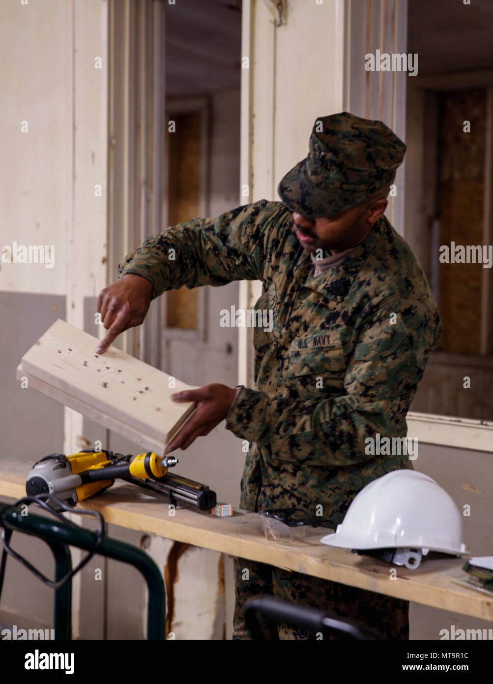 U.S. Navy Petty Officer 1st Class Brandon D. Flake, hospital corpsman ...