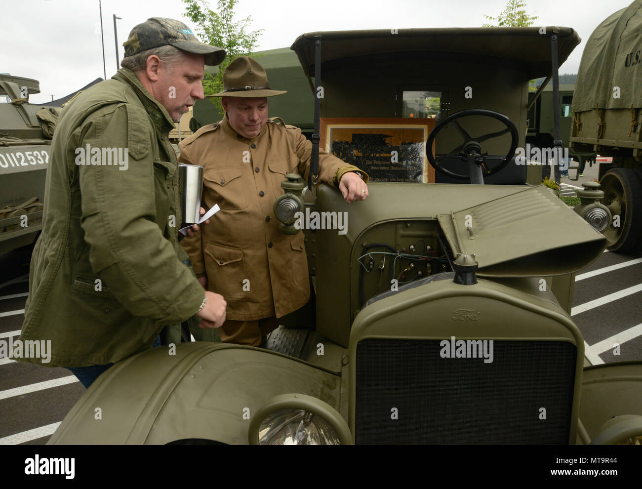 Jason Sample (right) shows Jay Will (left) the WWI Ford Model-T ...