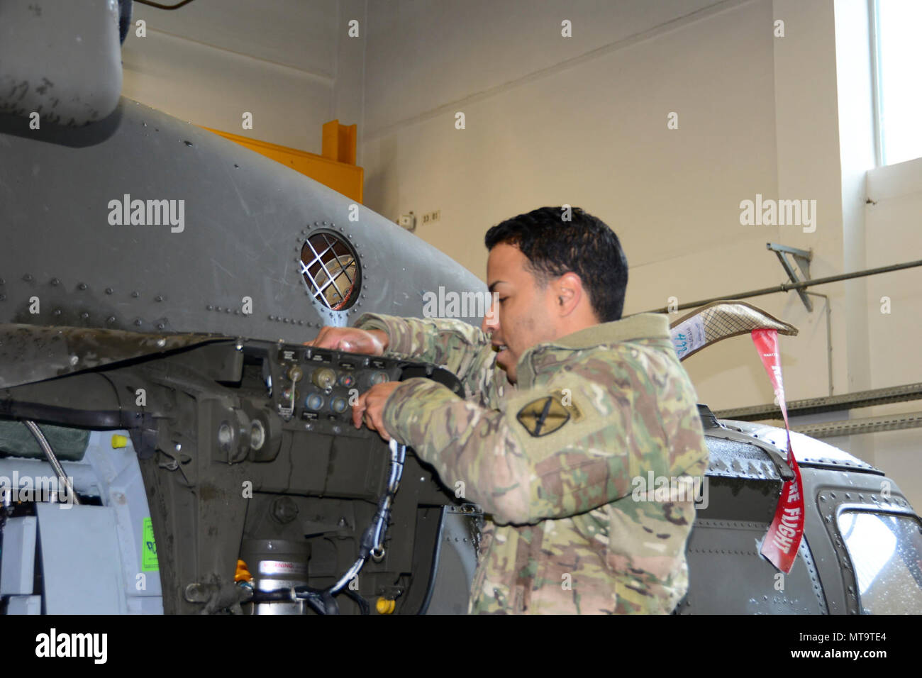 U.S. Army Spc. Alberto Rodriguez, a UH-60 Black Hawk crew chief (15T ...