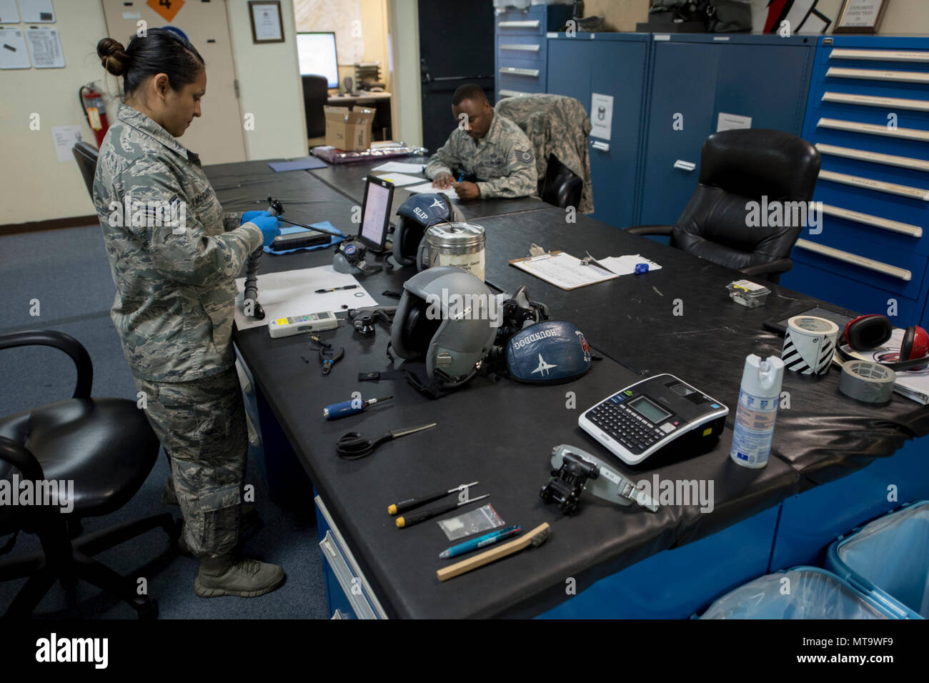 Aircrew flight equipment technicians from the 18th Operations Support ...