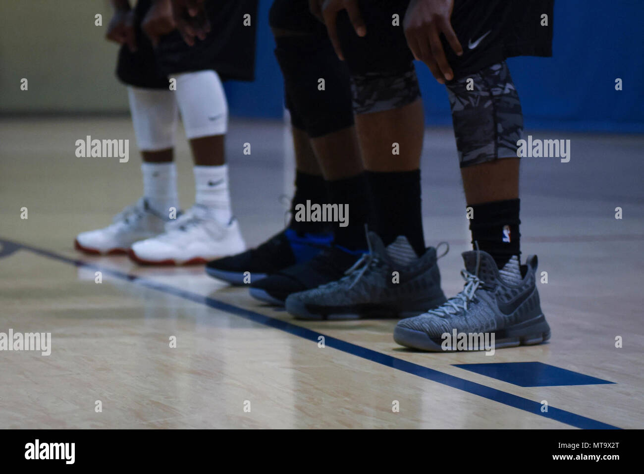 Members of the 2nd Security Forces Squadron basketball team and 2nd ...
