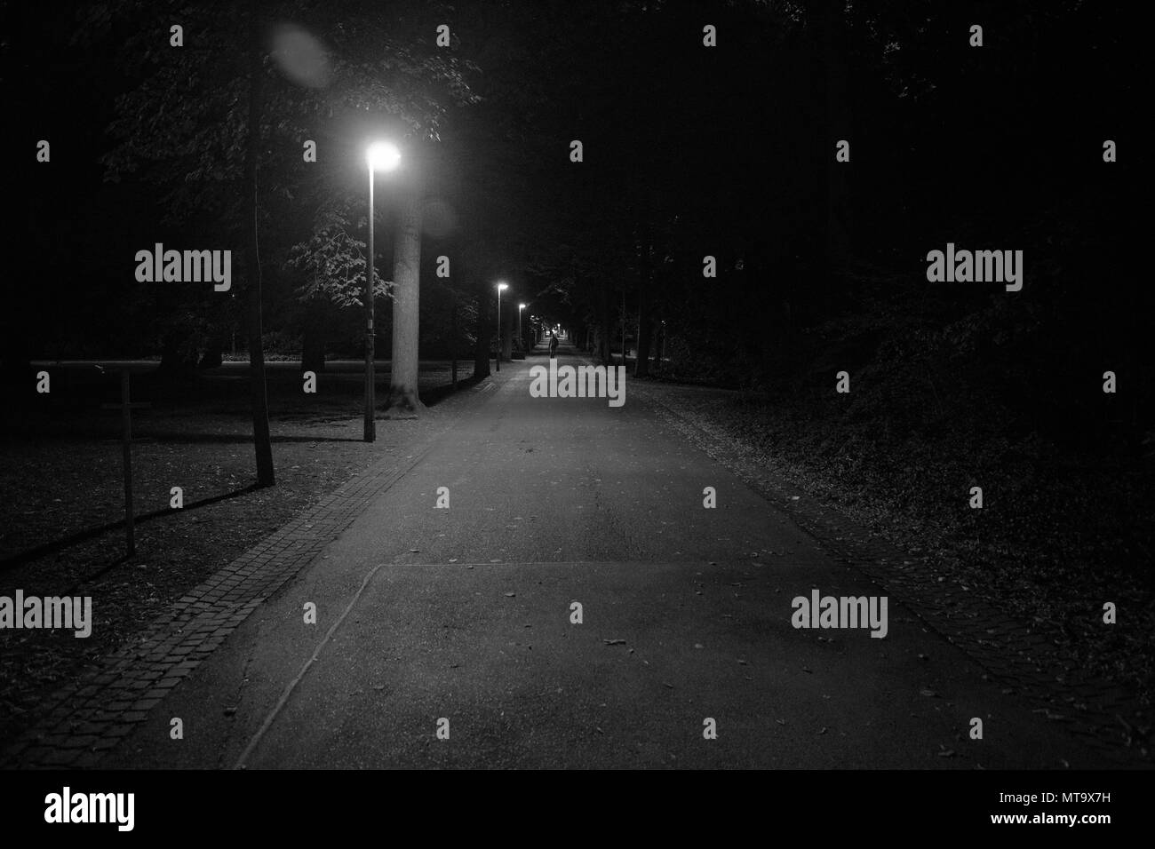 Through darkness Black and White Stock Photos & Images - Alamy