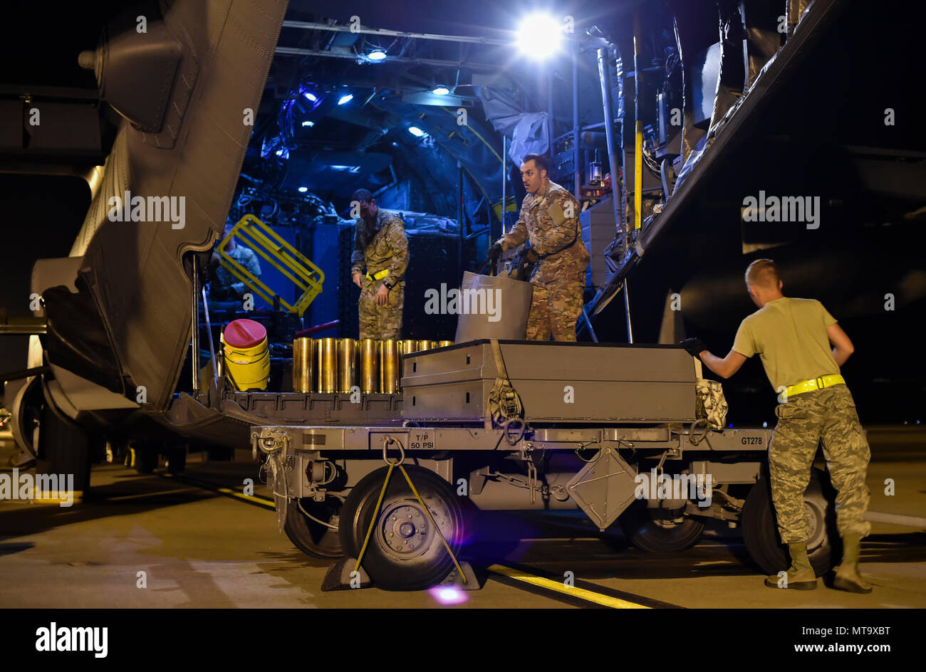 Staff Sgt, Shane Hayes, center, a special missions aviator with the 4th ...