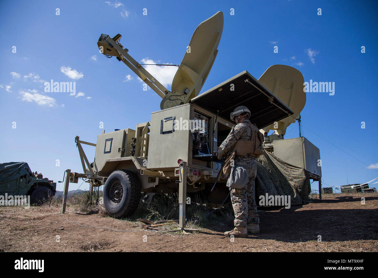U.S. Marine Cpl. David Chung, a field radio operator with Headquarters ...