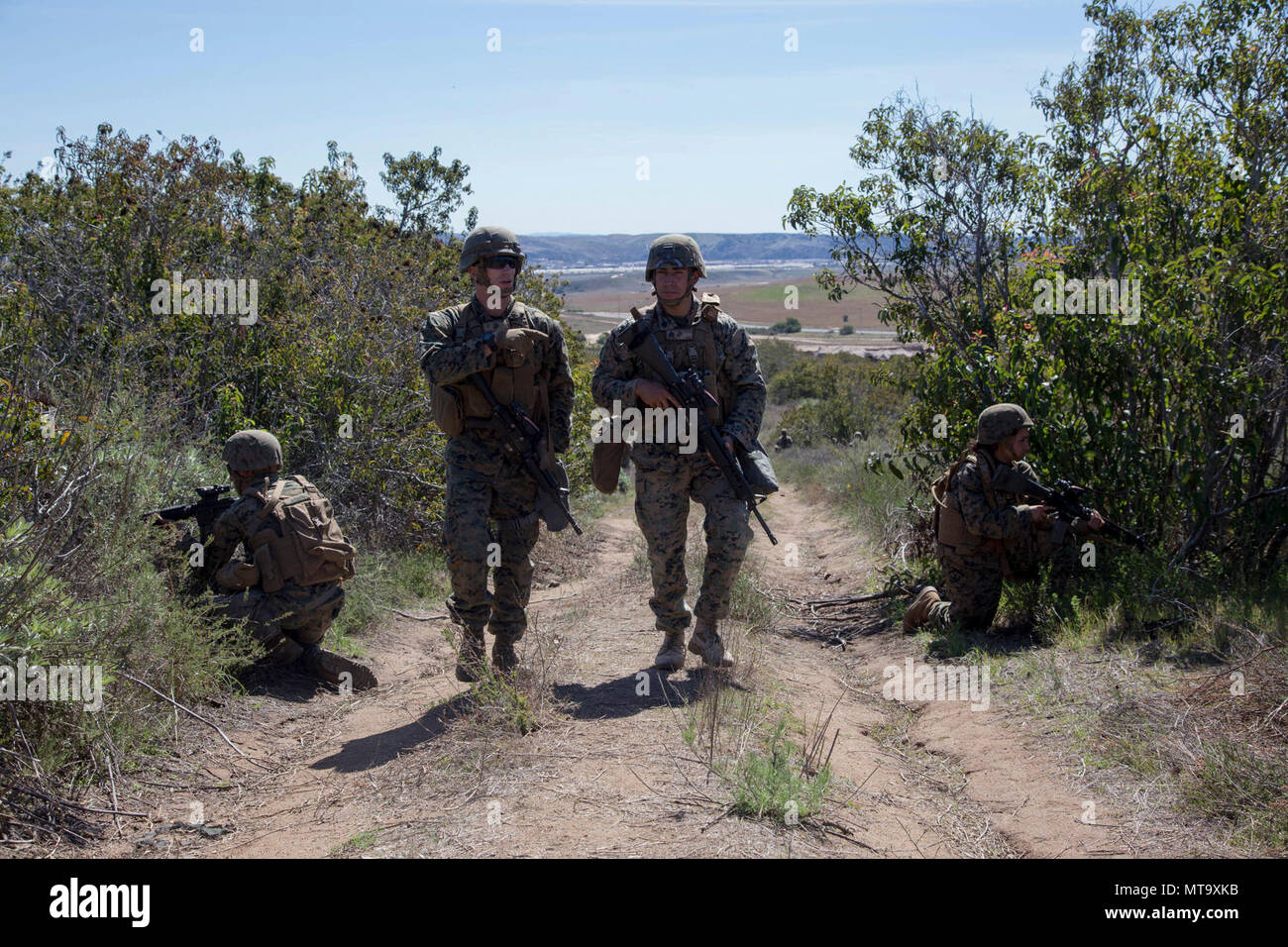 U.S. Marines 2nd Lt. Tyler Vanpelt, a supply officer, left, and Sgt ...