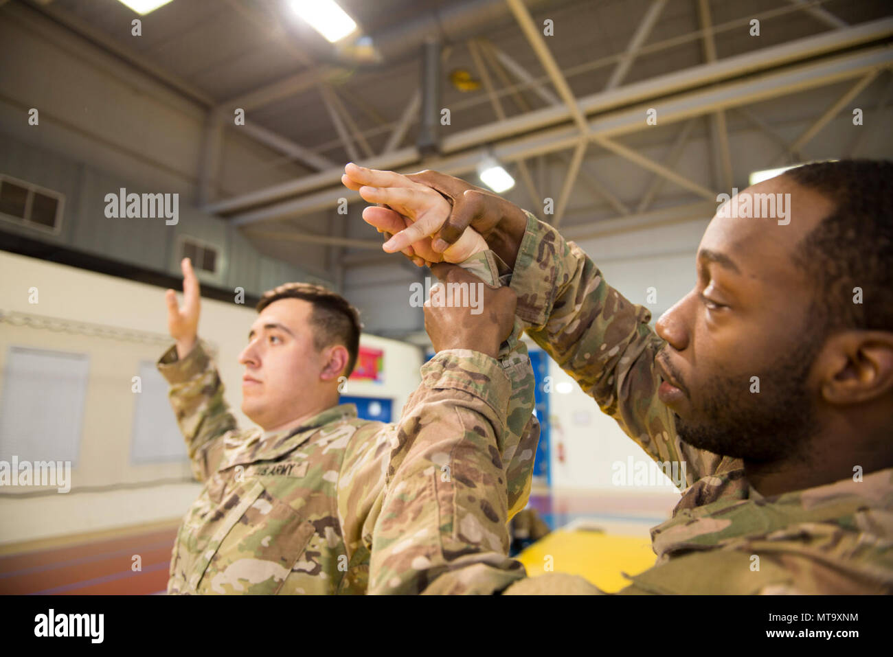 U.S. Army Sgt. James Thorne, with U.S. Army Network Enterprise Center ...