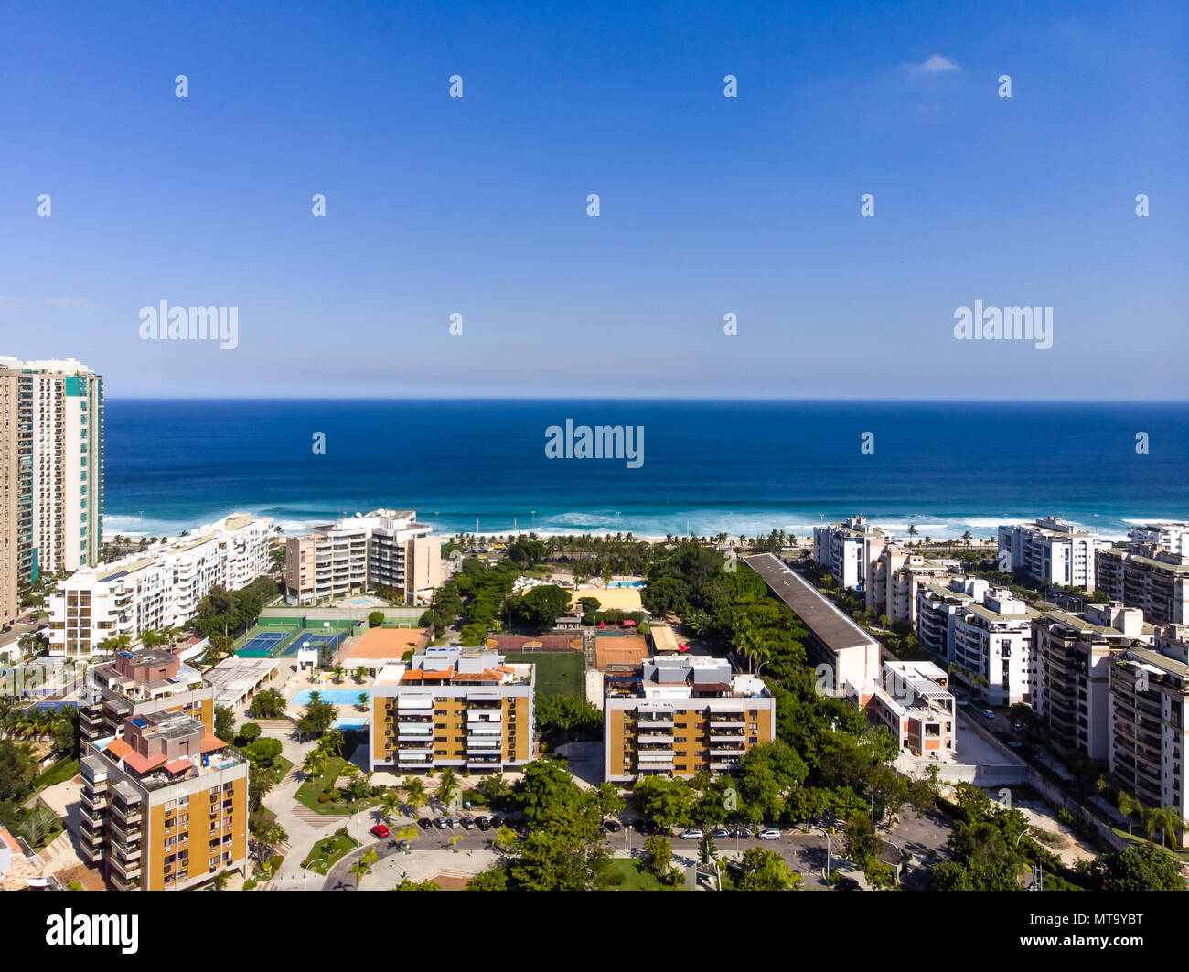 Aerial view of Barra da Tijuca beach during sunset, golden light. Rio ...