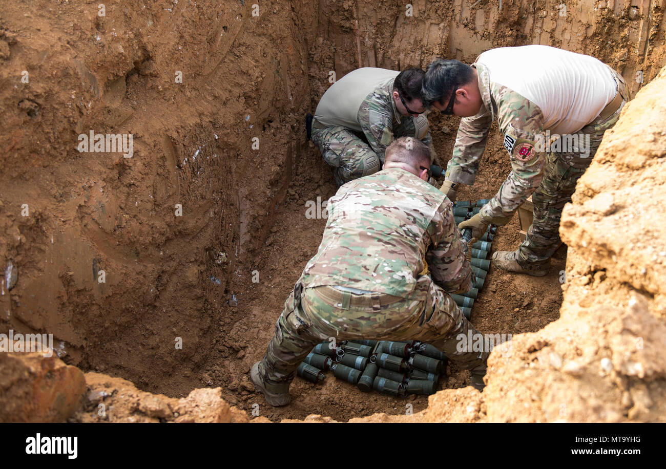 Explosive ordnance disposal team members from the 18th Civil Engineer ...