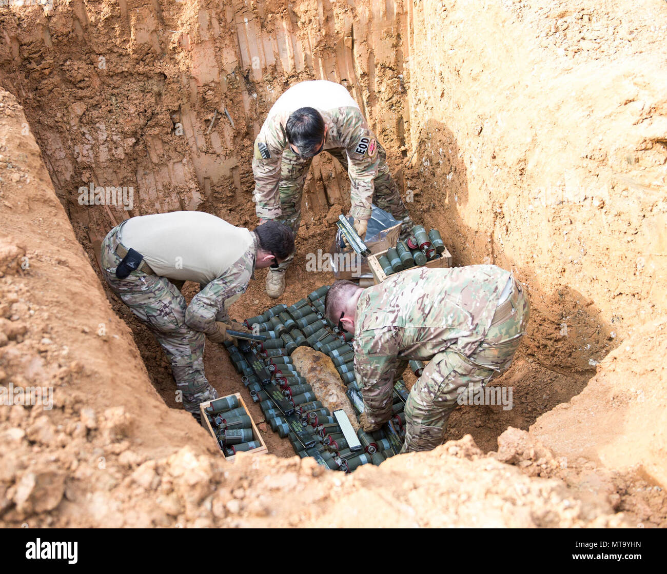 Explosive ordnance disposal team members from the 18th Civil Engineer ...