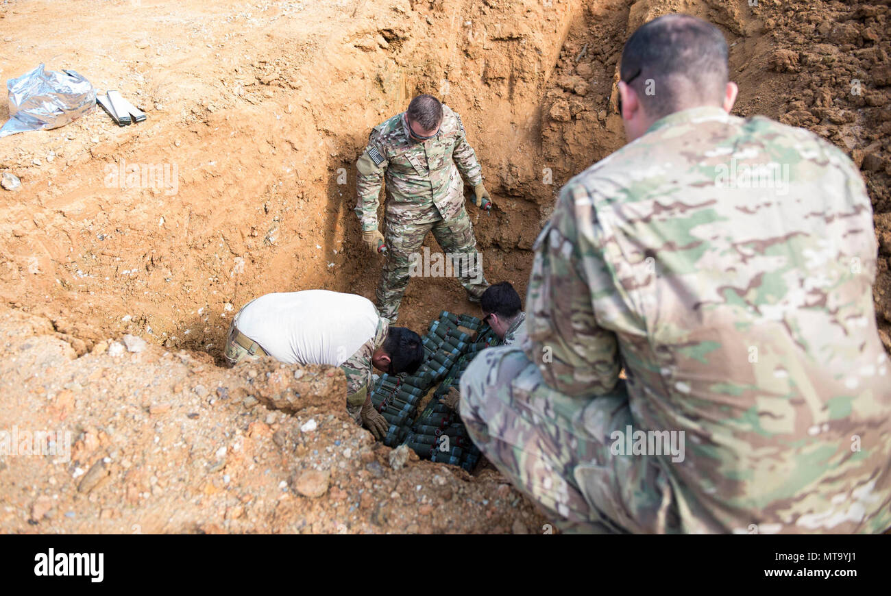Explosive ordnance disposal team members from the 18th Civil Engineer ...