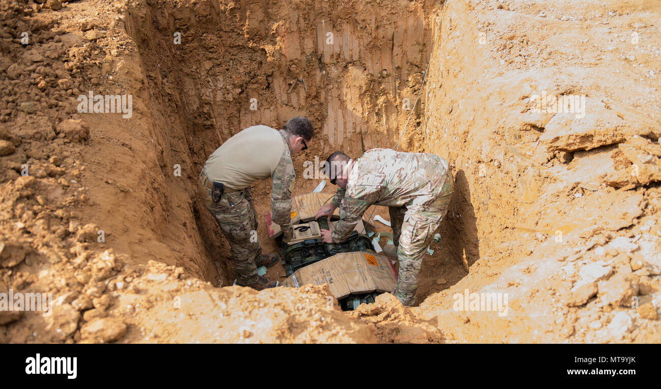 Explosive ordnance disposal team members from the 18th Civil Engineer ...