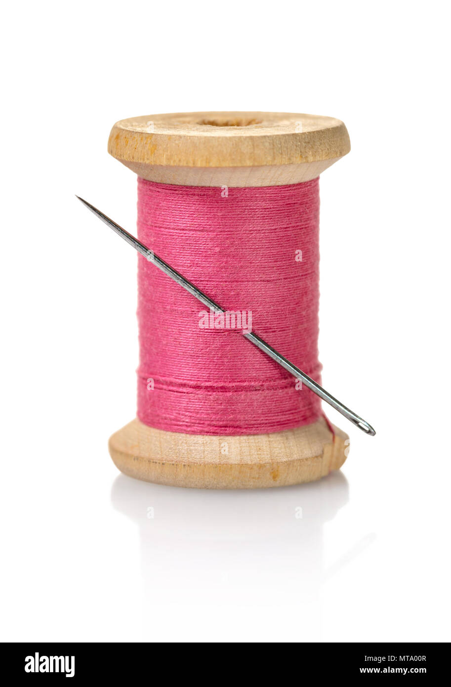 spool of pink threads on a white isolated background Stock Photo - Alamy