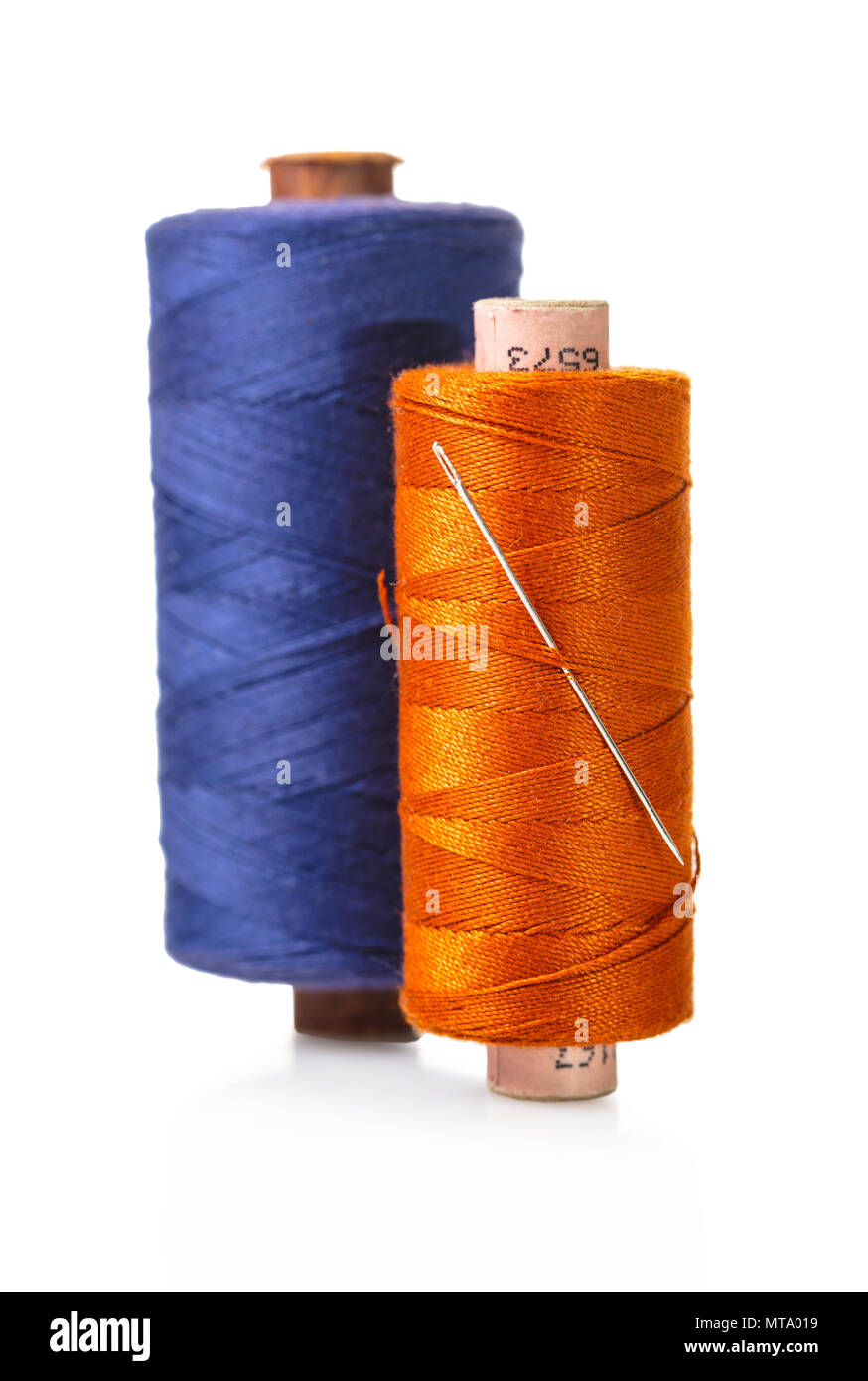 spool of thread with a needle on white isolated background Stock Photo ...