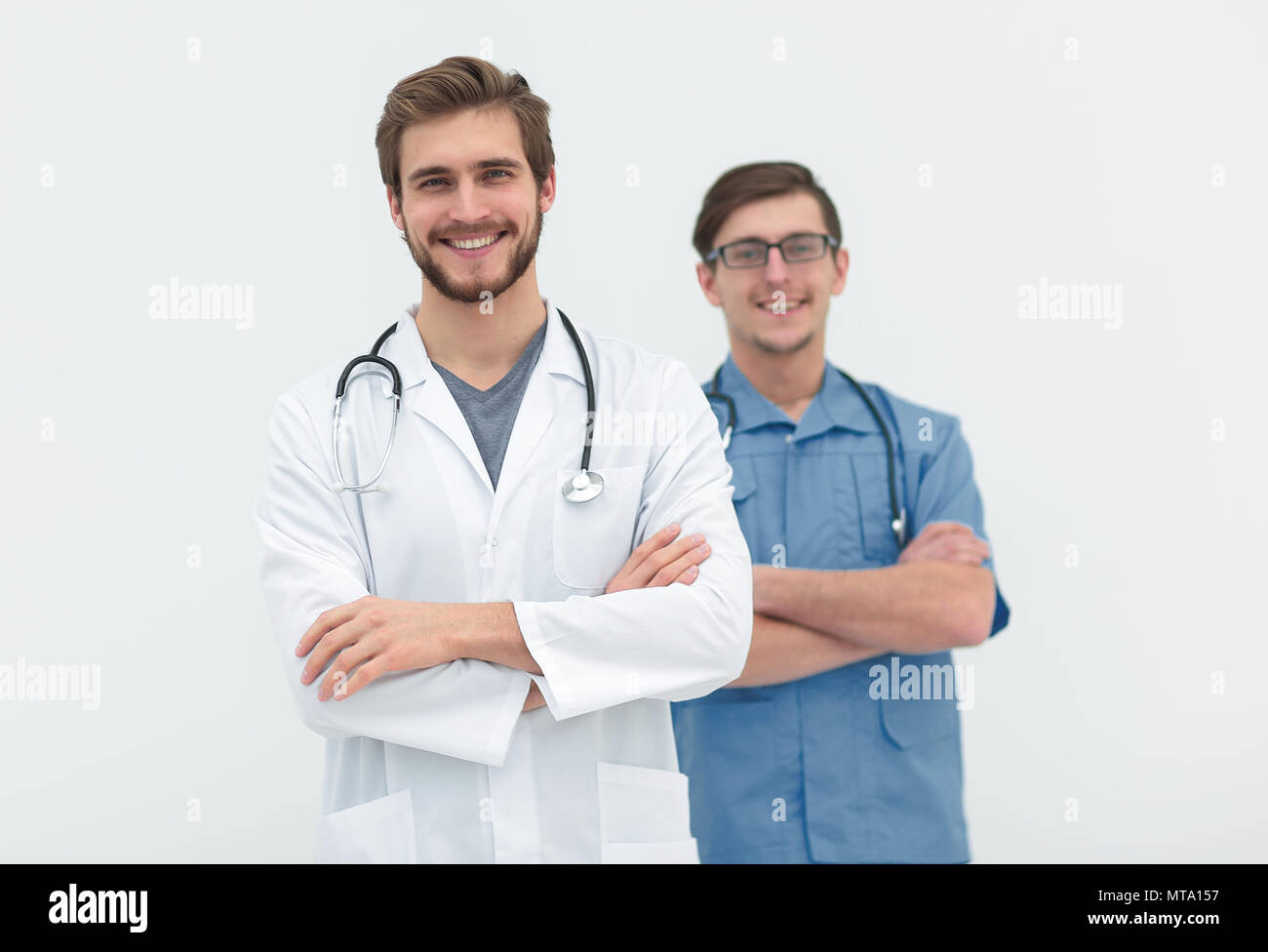 confident doctor and assistant .isolated on white Stock Photo - Alamy