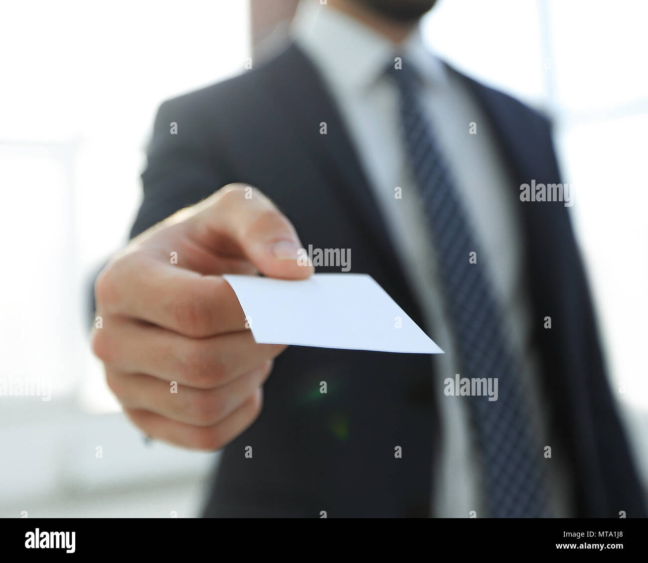 Business man giving business card on bright background Stock Photo - Alamy